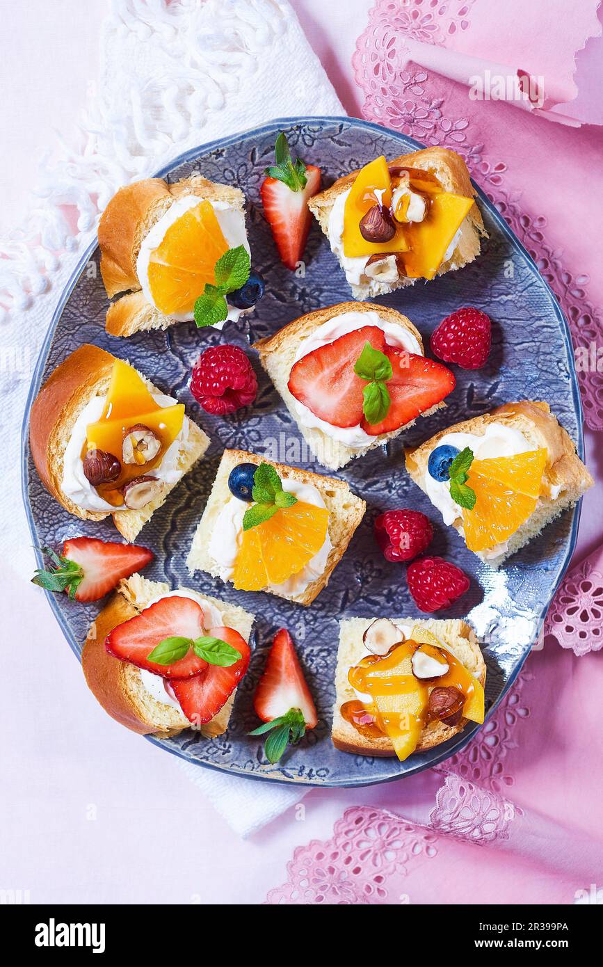 Sweet canapes with fruits Stock Photo - Alamy