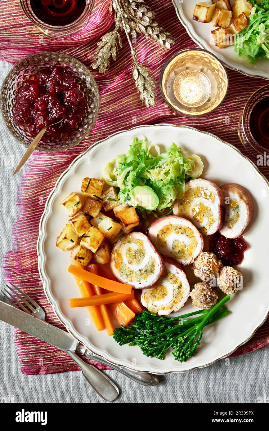 Turkey roulade with vegetables and roasted potatoes for Christmas Stock ...