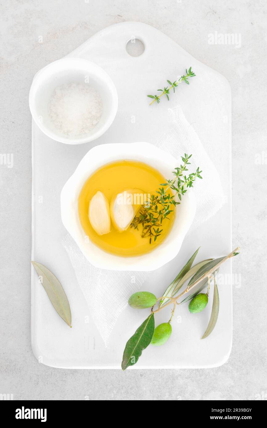 Olive oil with thyme garlic and salt Stock Photo - Alamy