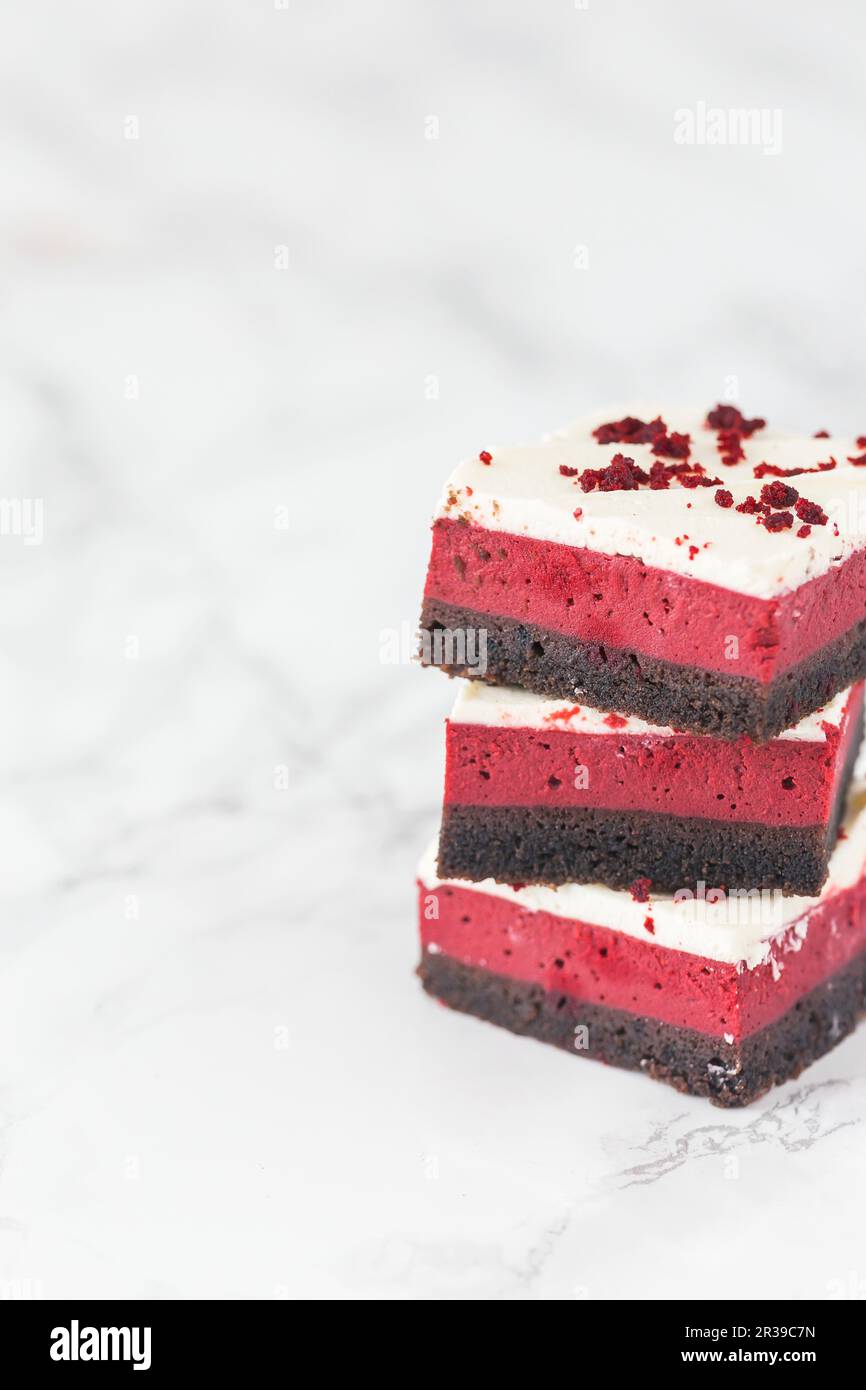 Stack of a red velvet cheesecake brownie squares Stock Photo - Alamy