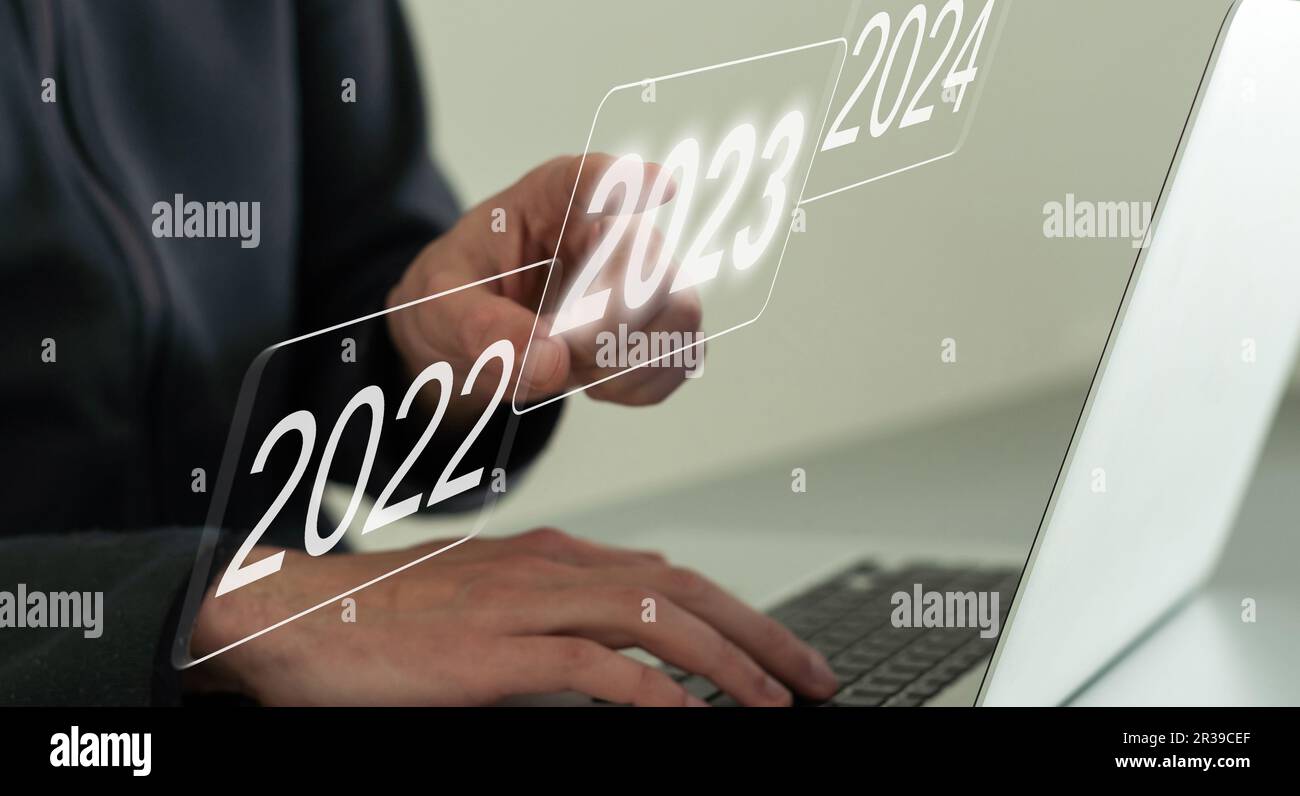 Businessman pointing to digital 2024 on virtual screen. Countdown to ...