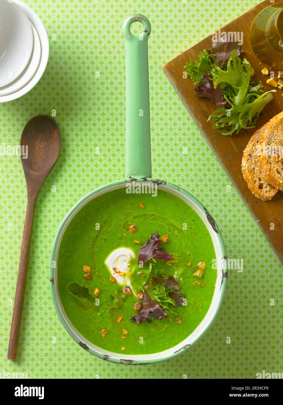 Cream of pea soup in a saucepan Stock Photo - Alamy