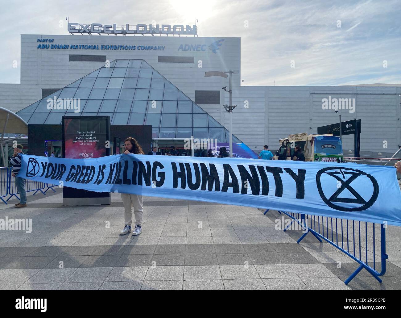 Climate protesters gathering outside the Excel centre in east London ...