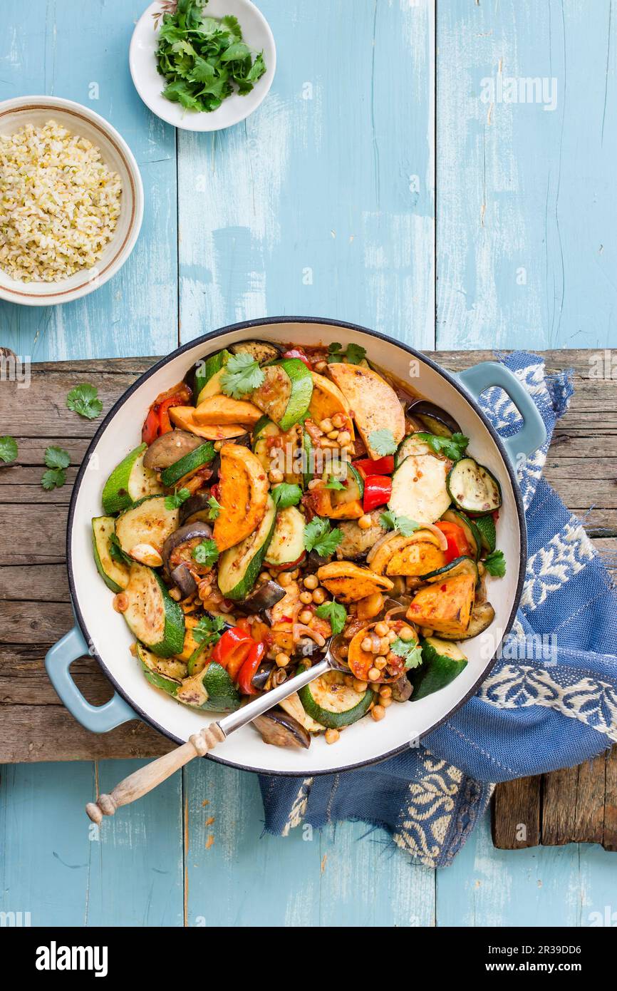 Tajine made of zucchini, eggplant, red pepper, sweet potato and ...
