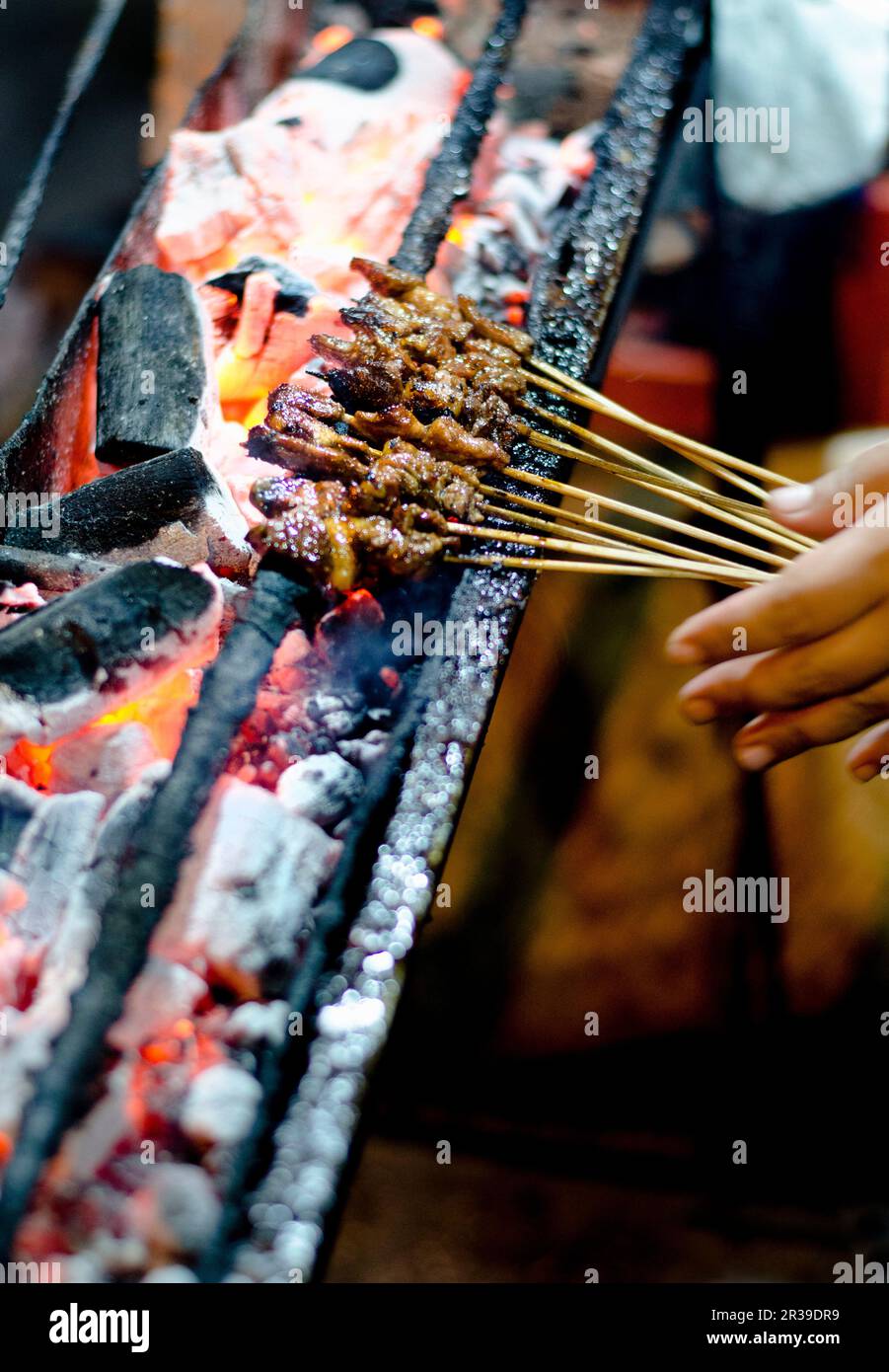 A close up of lamb satays on charcoal satay grill in Indonesia Stock ...