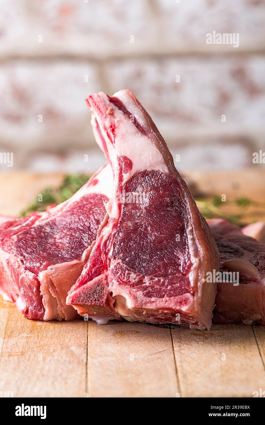 Raw beef chops hi-res stock photography and images - Alamy