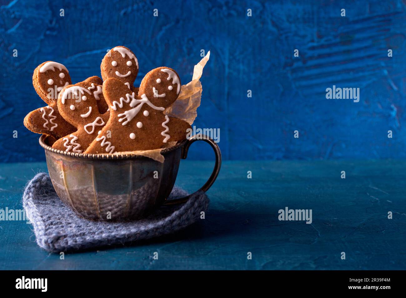 Gingerbread men in a cup Stock Photo - Alamy