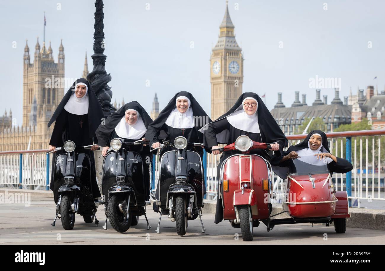 EDITORIAL USE ONLY Actress Lorna Watson leads a fleet of moped drivers ...