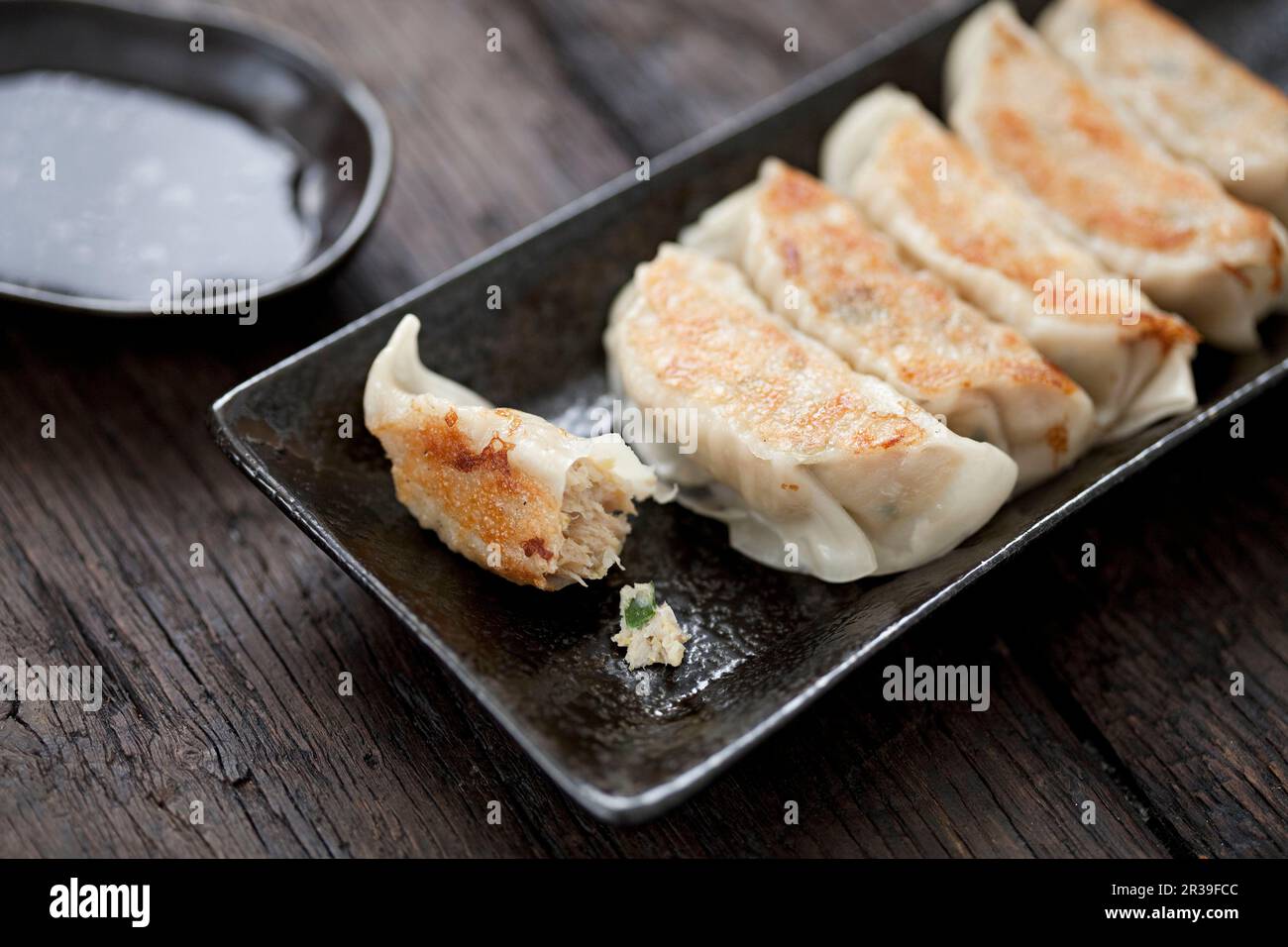 A platter of Gyoza with Soy dipping sauce Stock Photo - Alamy