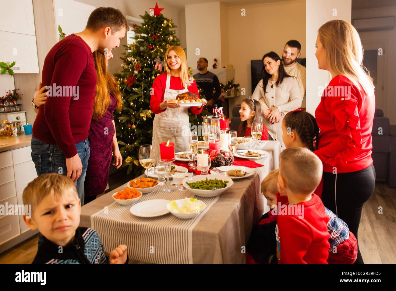 Friends gathered around table hi-res stock photography and images - Alamy