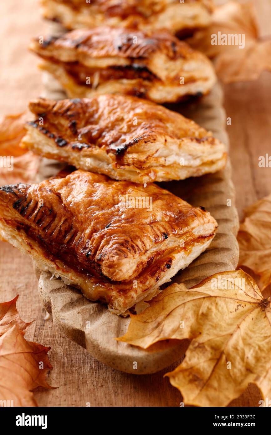 Apple pies with puff pastry and autumn leaves Stock Photo - Alamy