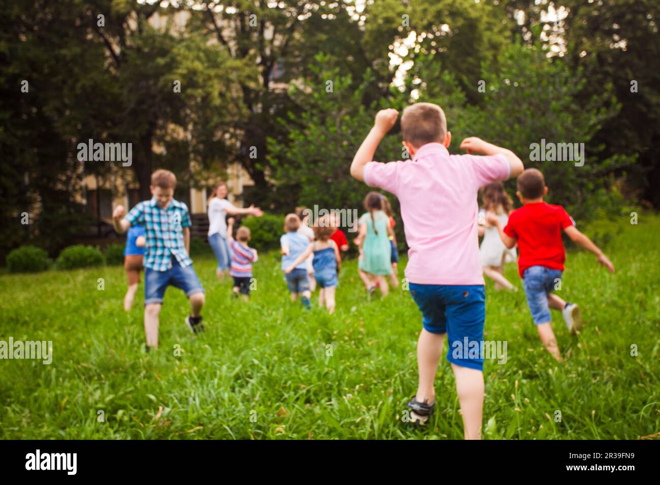 Child back view play hi-res stock photography and images - Alamy