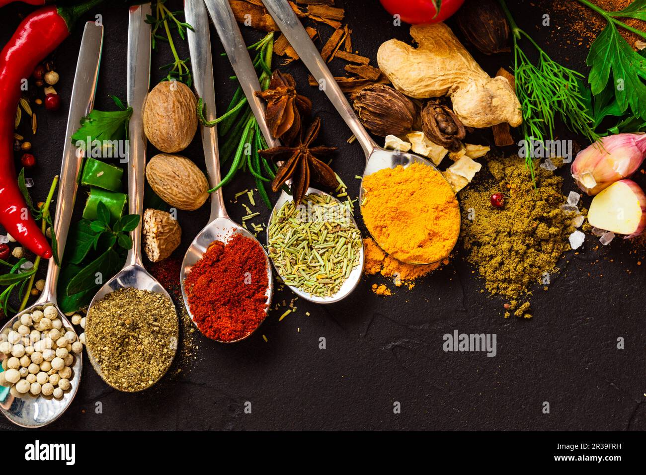 Salt and pepper cooking over stone table top view hi-res stock ...