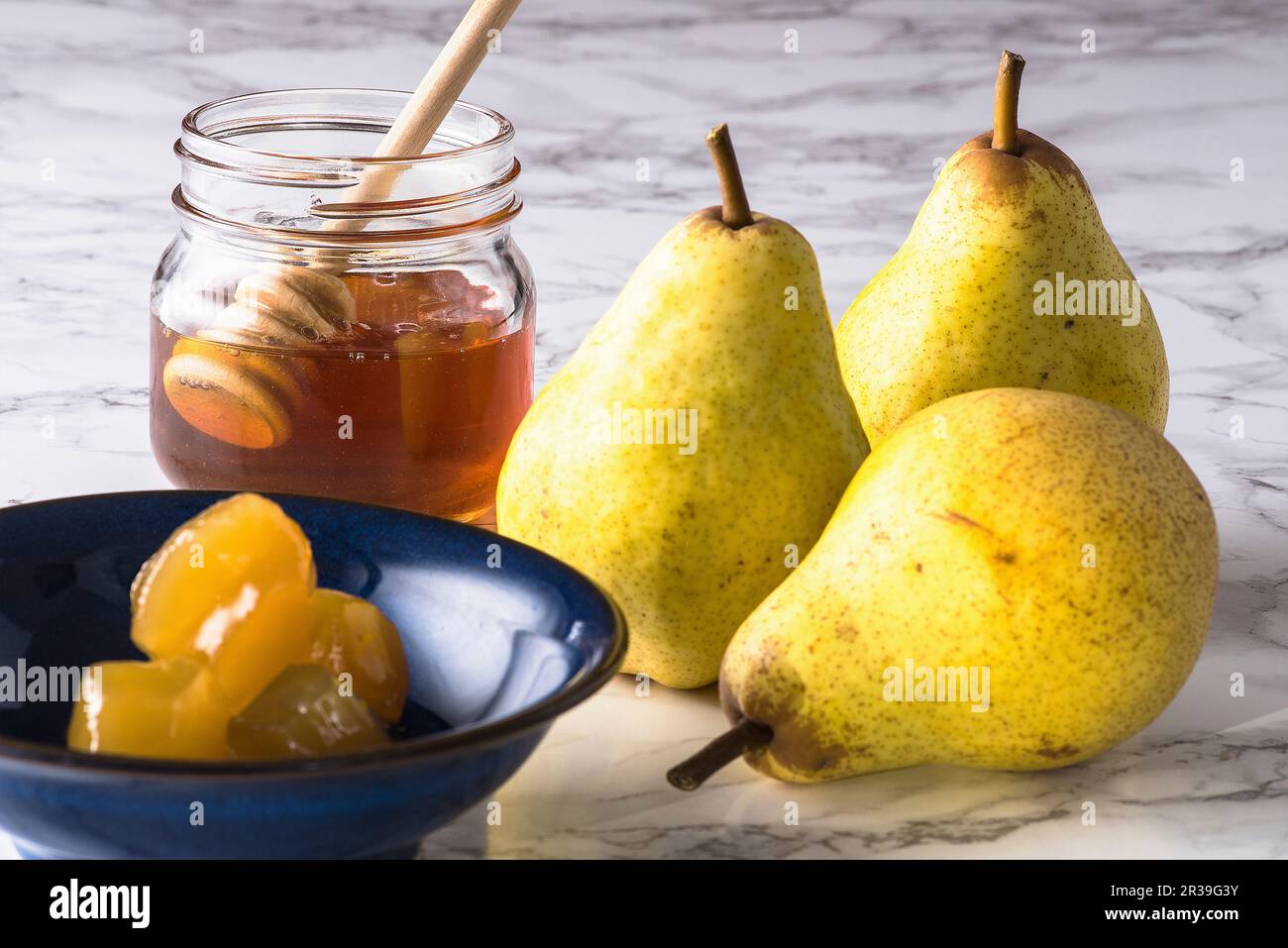 Pears with honey Stock Photo - Alamy