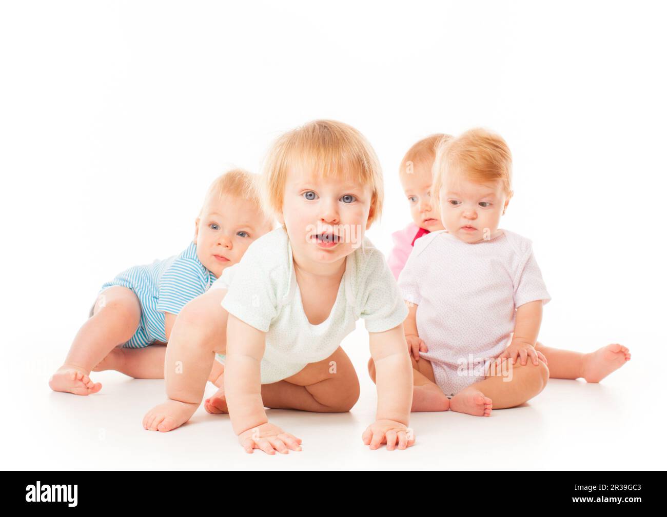 Group of funny babies sitting on white background, isolated Stock Photo ...