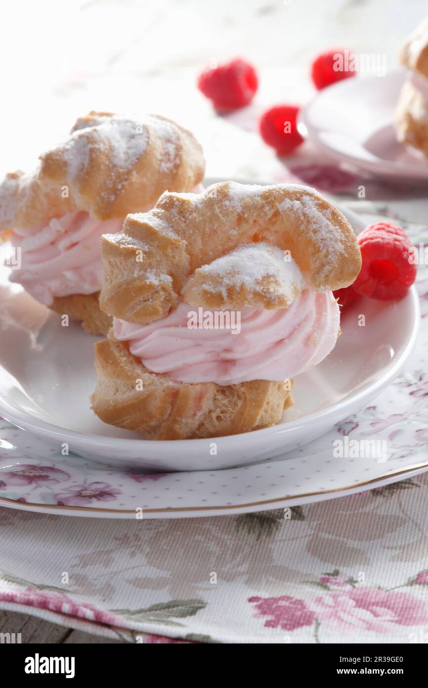 Puff with raspberry cream Stock Photo - Alamy