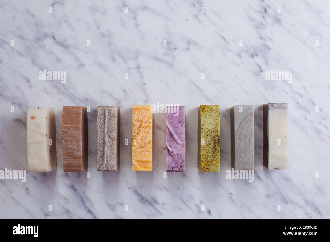 Different handmade soap bars, flat lay, top view. Eco soap and ...