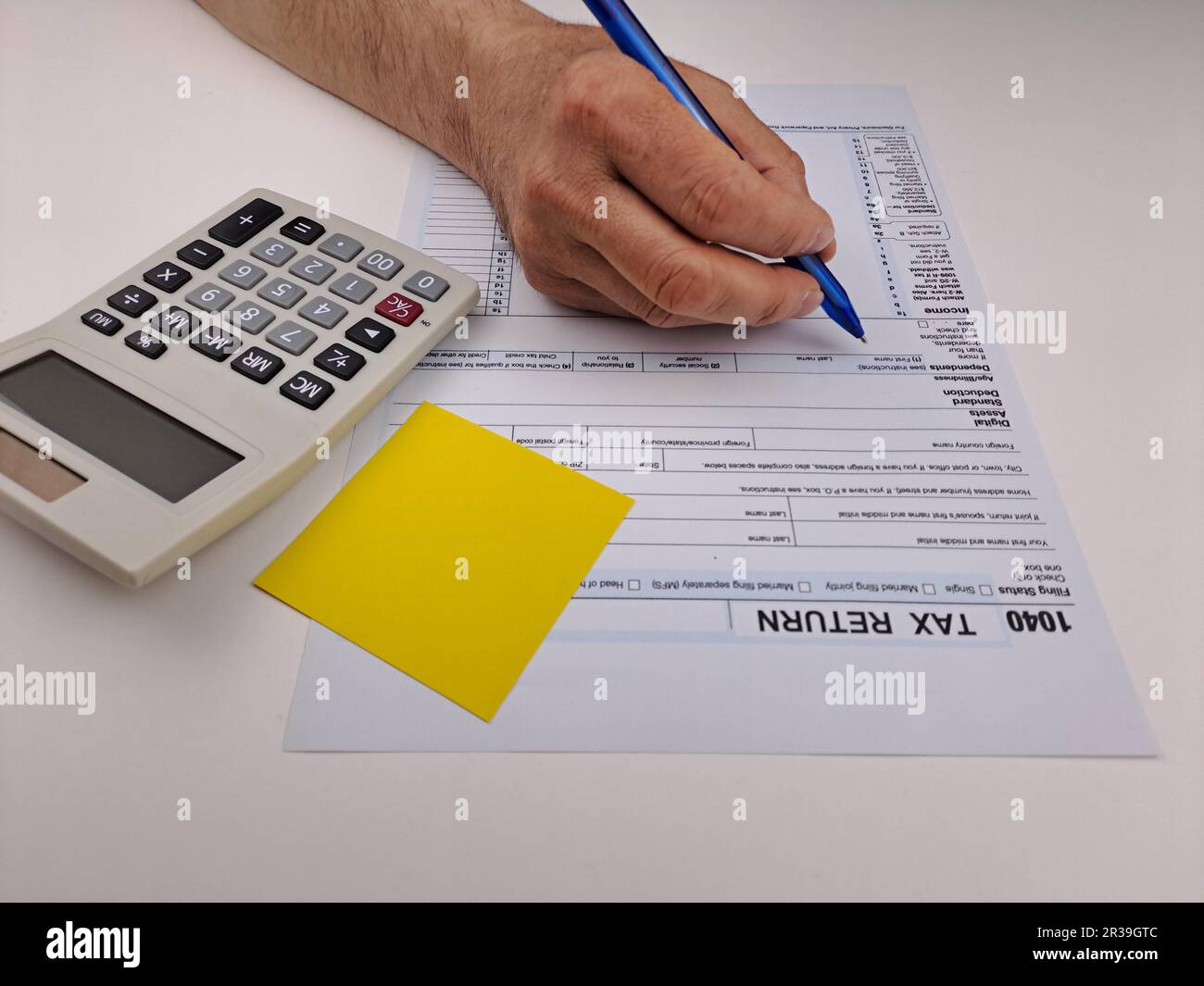 American Tax Return Form 1040, US Individual Tax Return, desk with ...