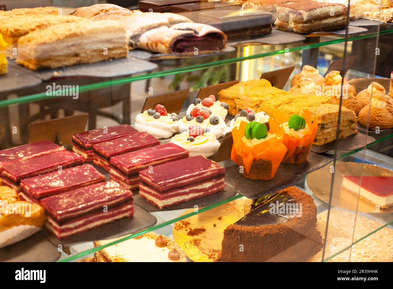 Different types of cakes pieces in pastry shop Stock Photo - Alamy