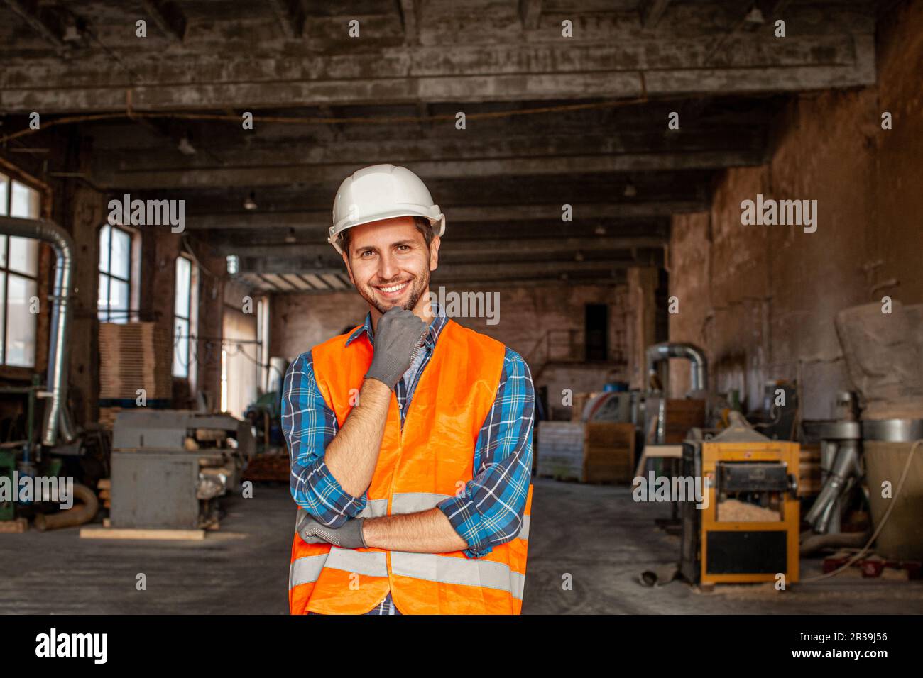 Portrait of young foreman with hard hat Stock Photo - Alamy