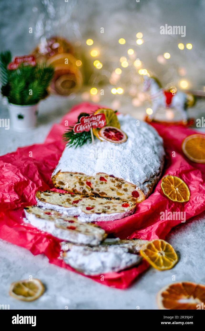 Christmas stollen unfolded from the festive packaging Stock Photo - Alamy