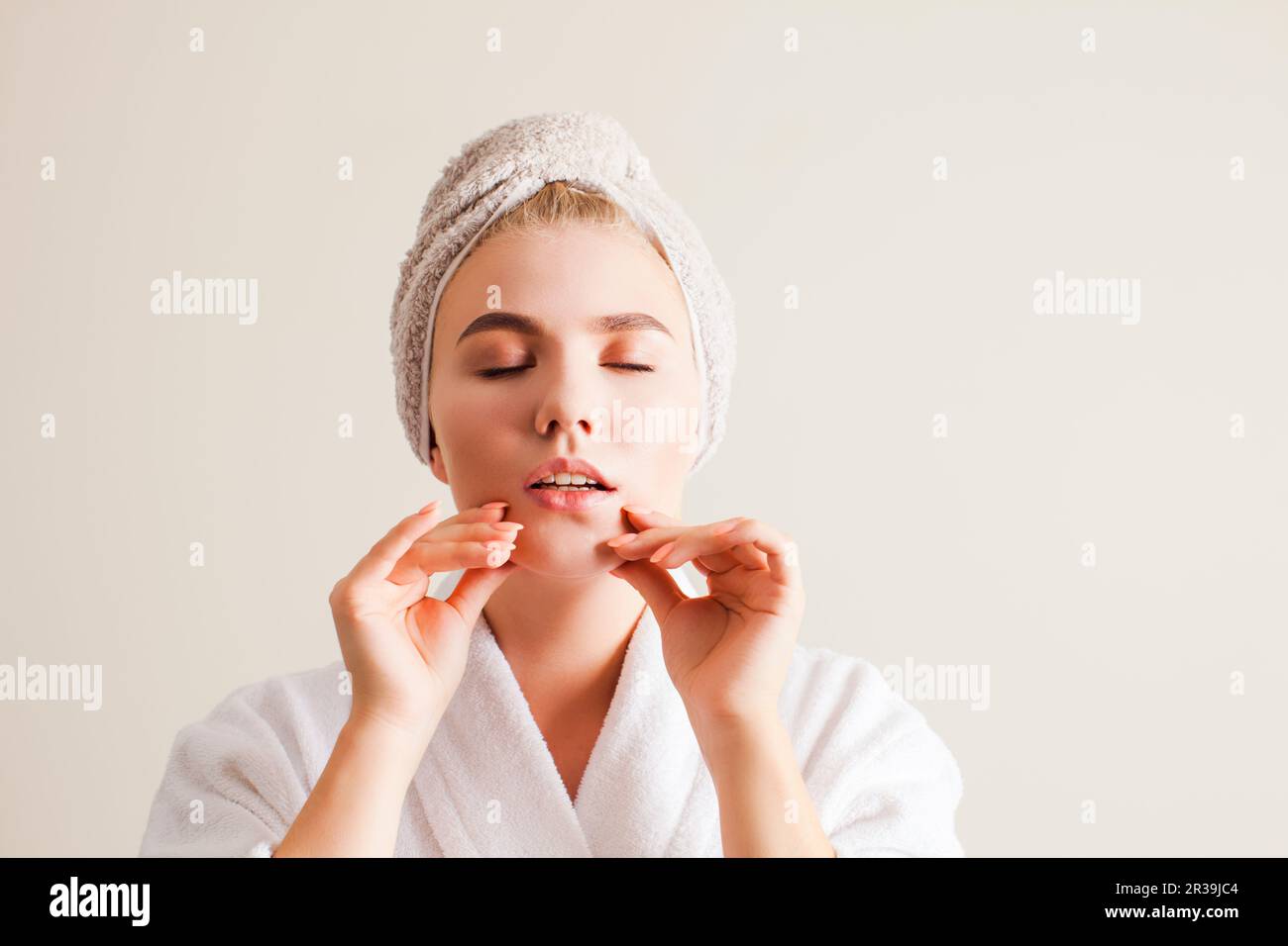 Woman Doing Exercises To Improve Skin At Home Facial Gymnastics Stock