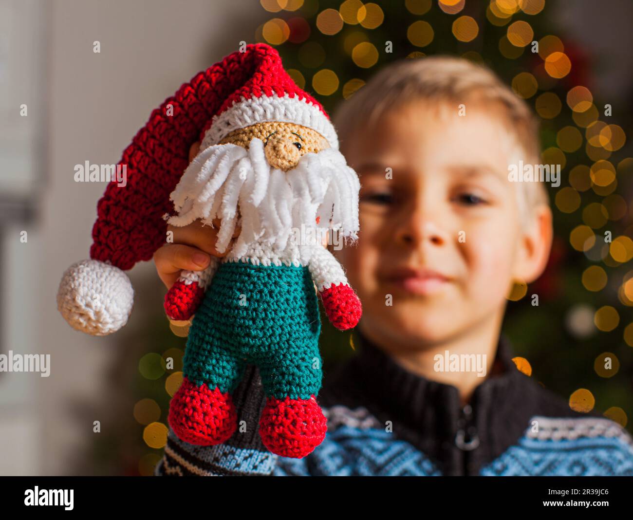 The little boy demonstrating his favorite Christmas toy Stock Photo - Alamy