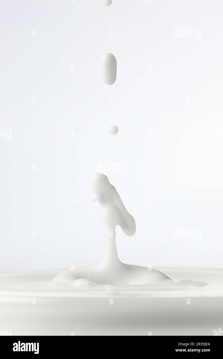 Closeup shot milk drops hi-res stock photography and images - Alamy