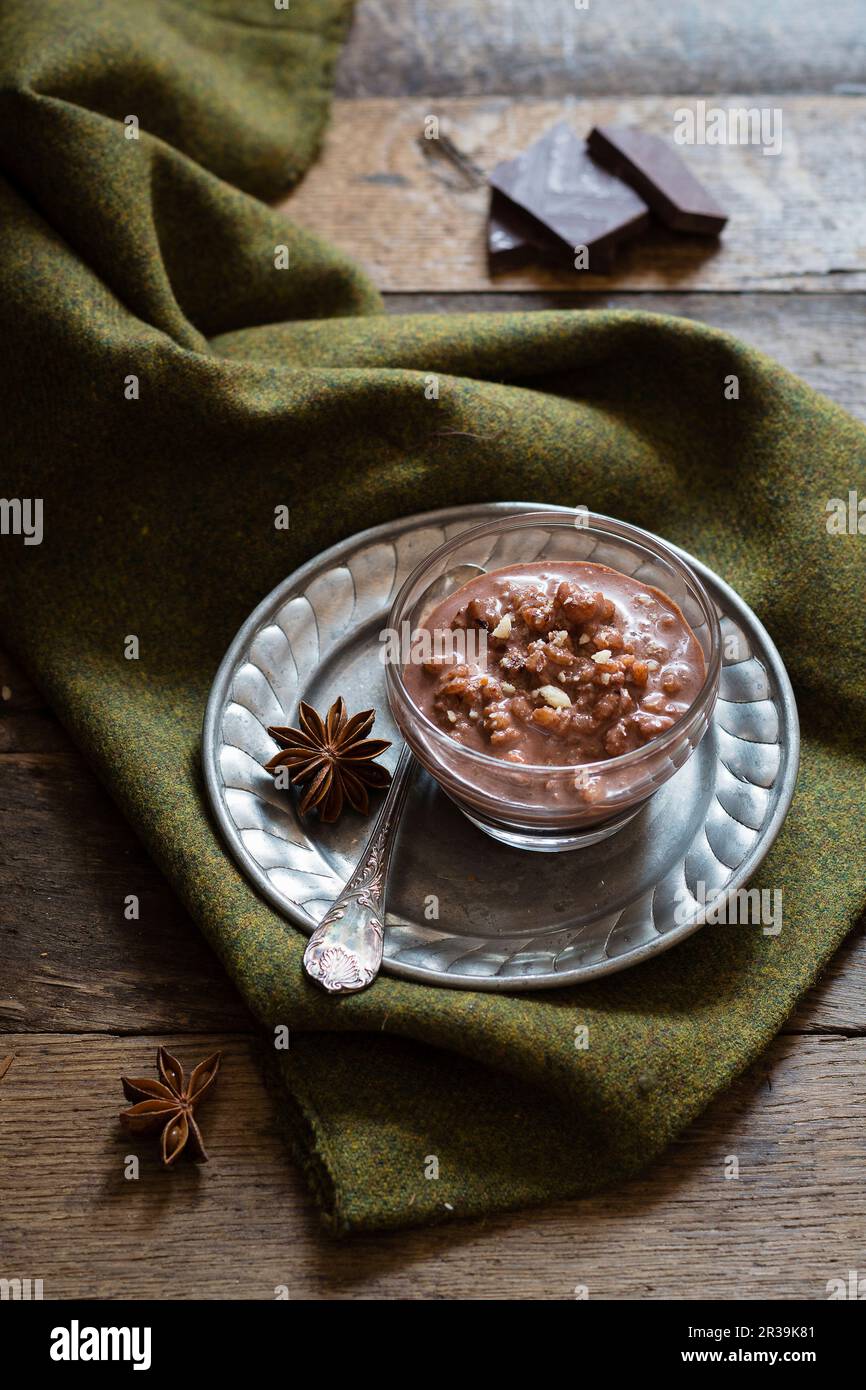 Chocolate rice pudding with star anise Stock Photo - Alamy