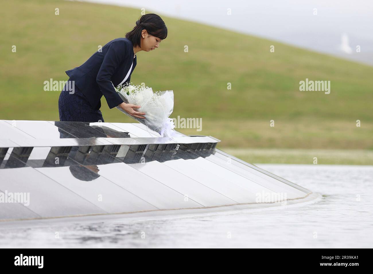 Japan's Princess Kako of Akishino offers flowers at Ishinomaki ...