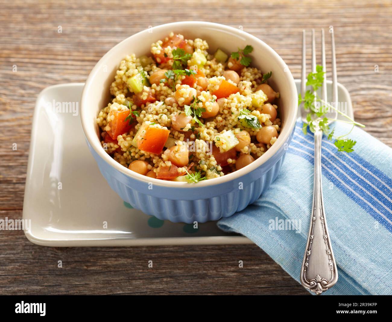 Vegetarian millet salad with chickpeas and vegetables Stock Photo - Alamy