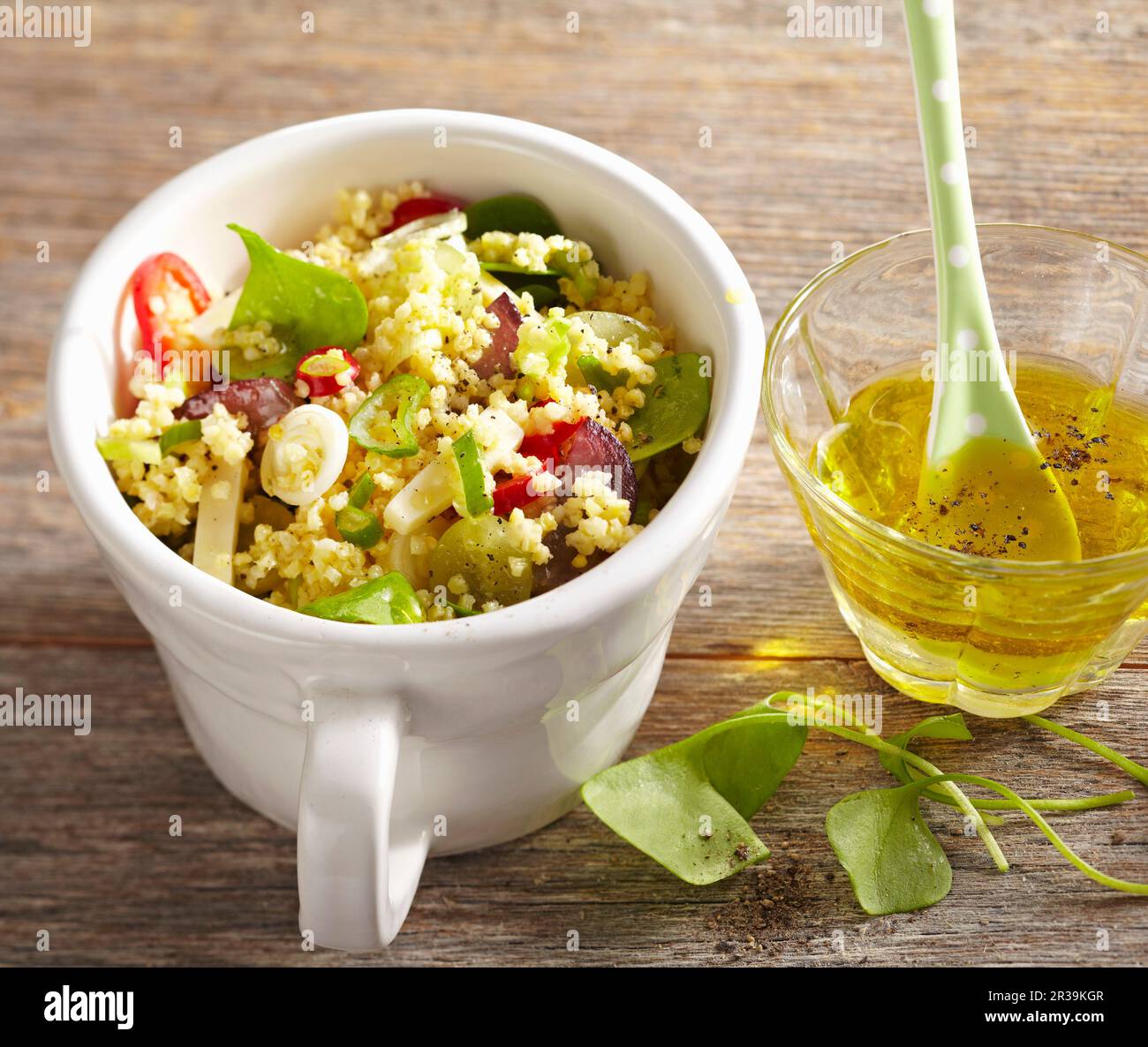 Millet salad with cheese and vegetables Stock Photo - Alamy