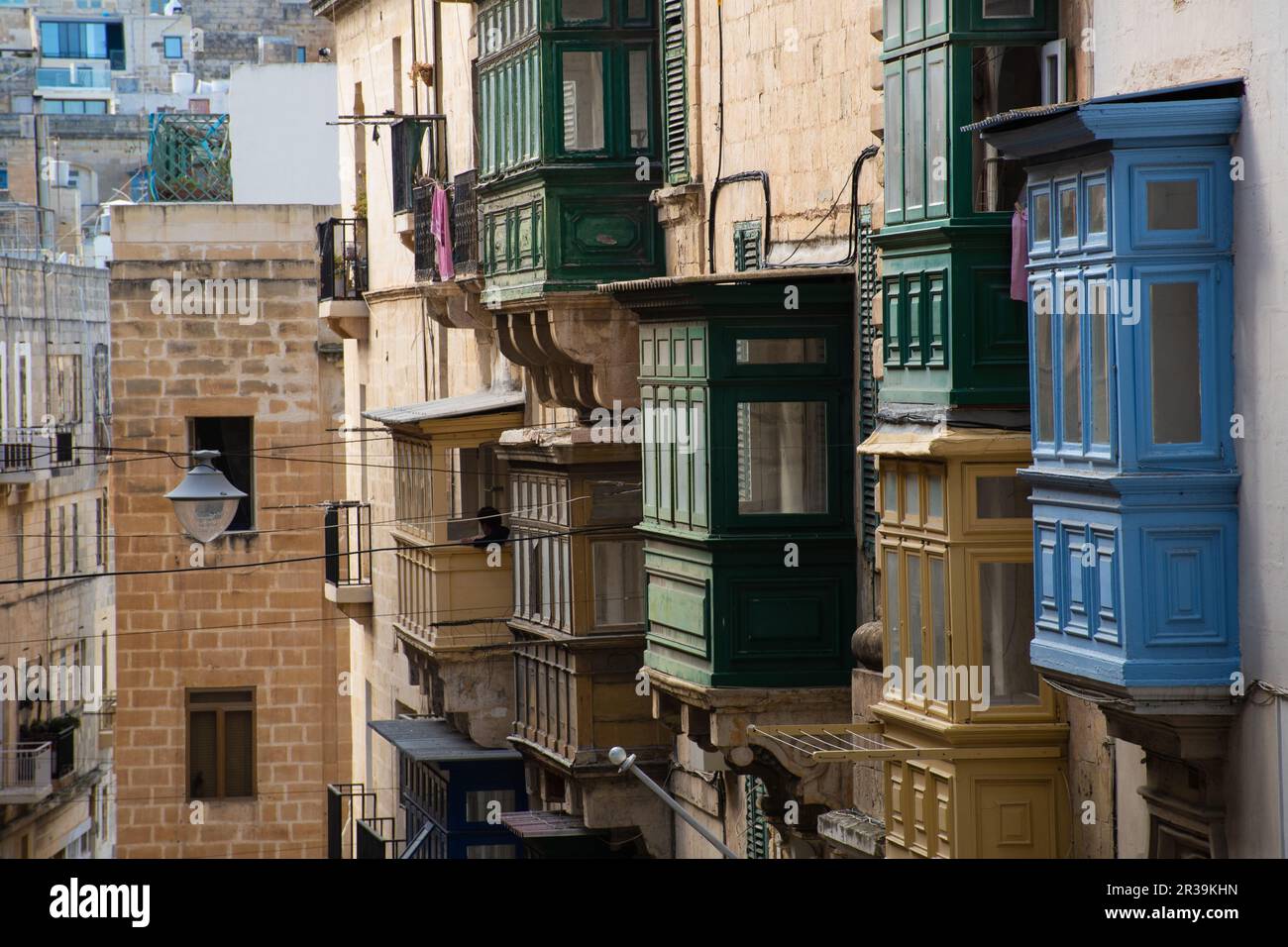 Row of traditional colorful balconies in Malta Stock Photo - Alamy
