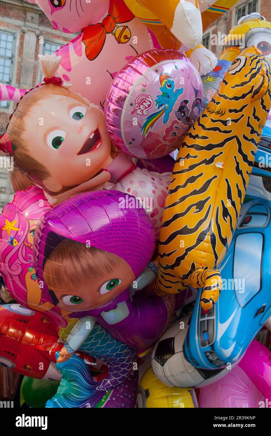 Colourfull folic baloons with helium Stock Photo - Alamy