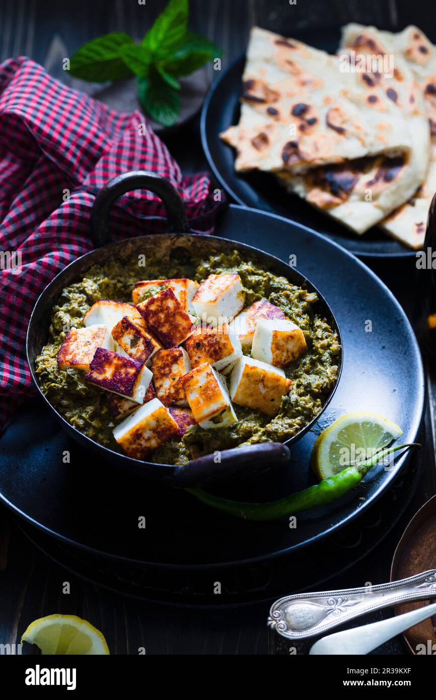Saag paneer (fried cheese on spinach, India Stock Photo - Alamy