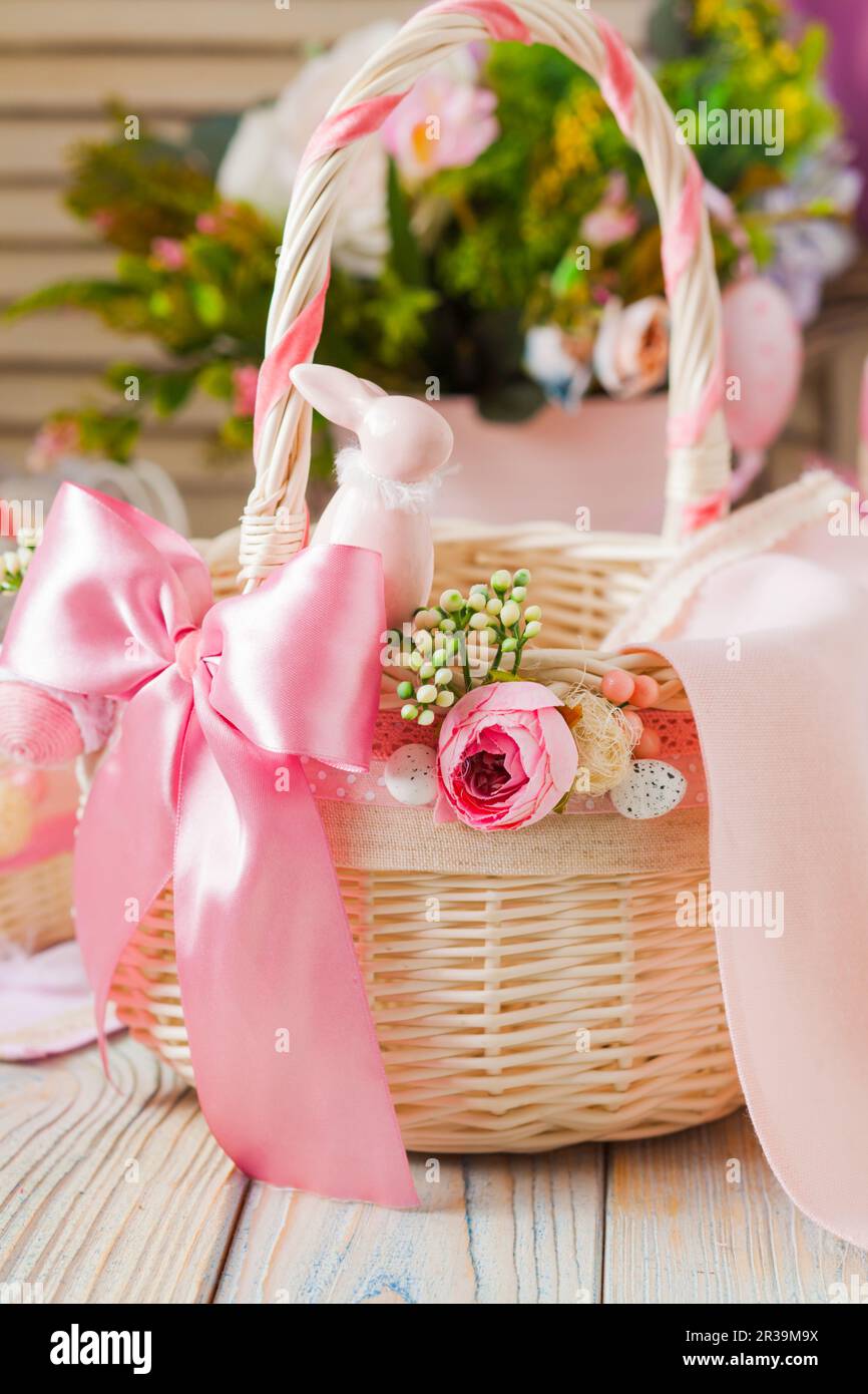 Spring floral design on wicker basket, rustic style Stock Photo - Alamy