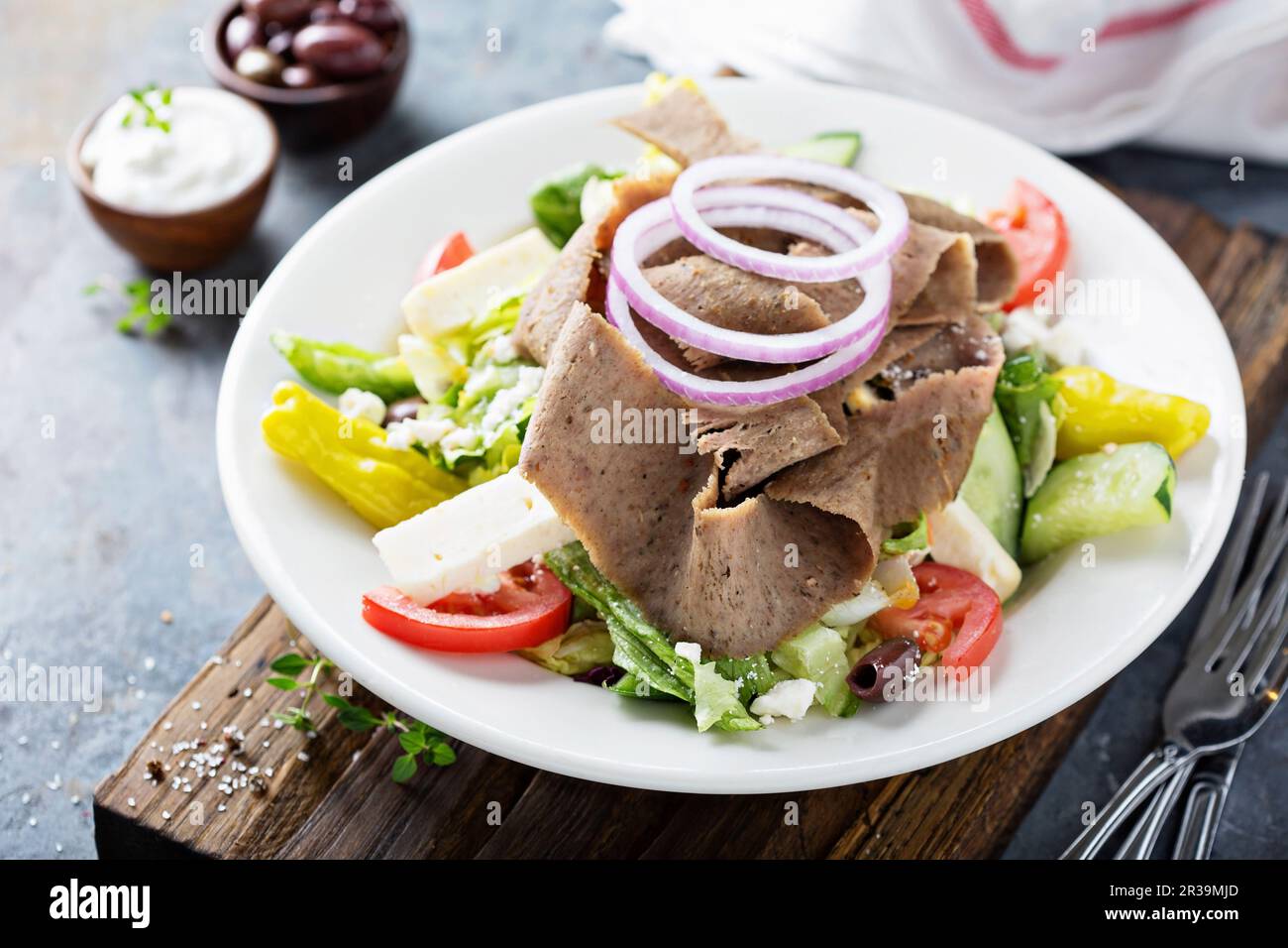 Gyro salad with thinly sliced meat and vegetables, healthy greek ...