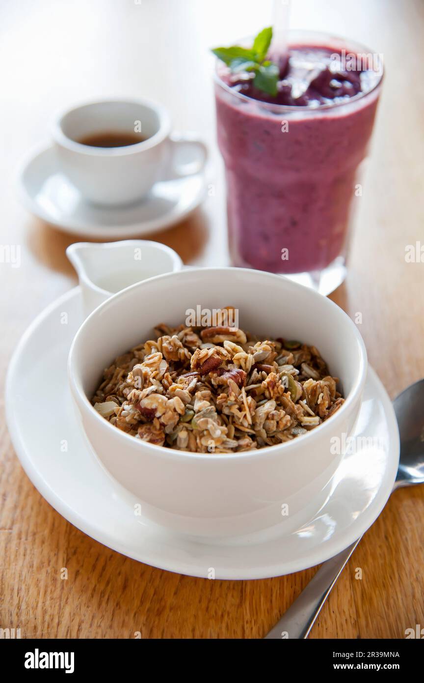 Breakfast muesli, a smoothie and coffee Stock Photo - Alamy