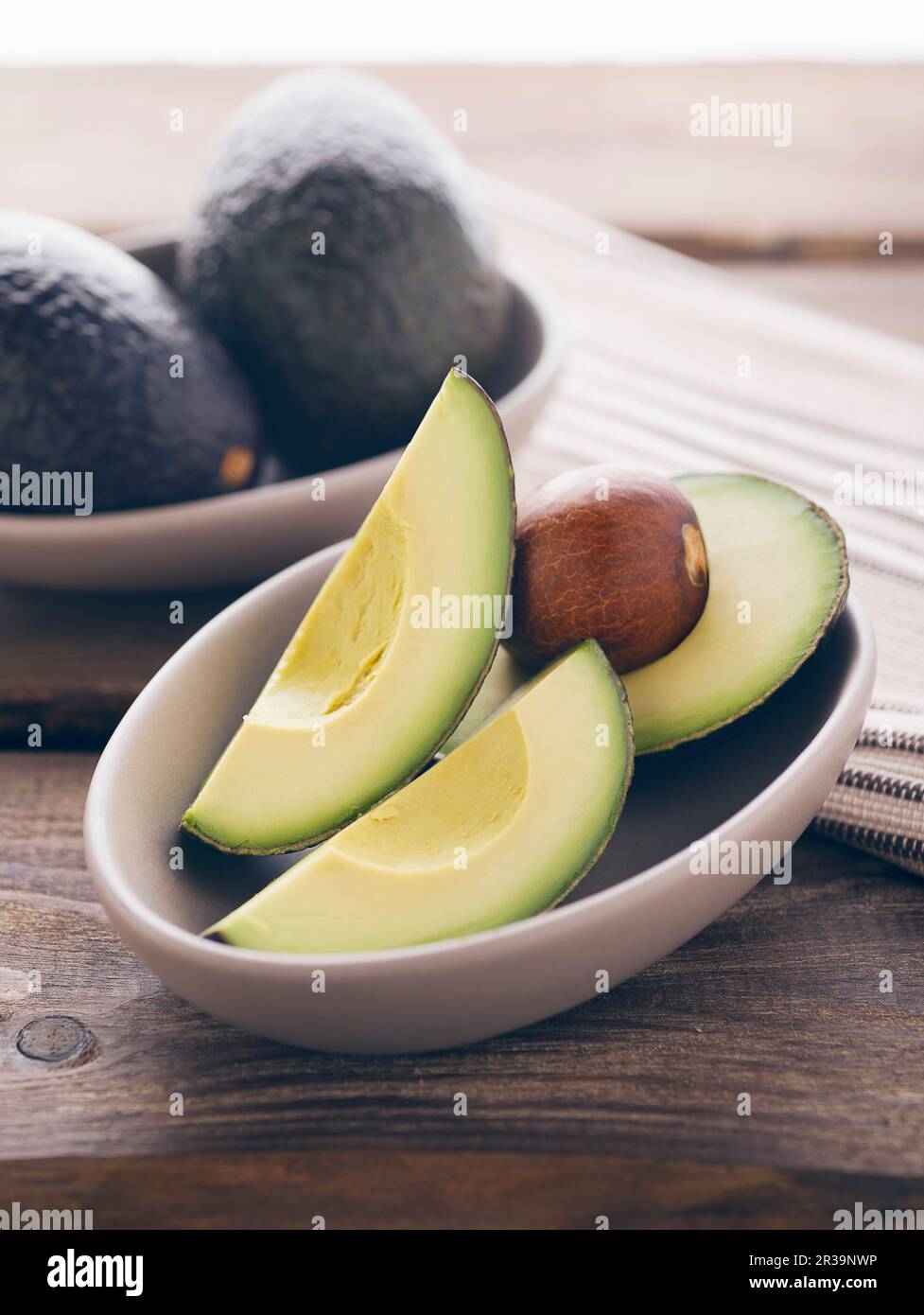 Avocado, whole and sliced Stock Photo - Alamy