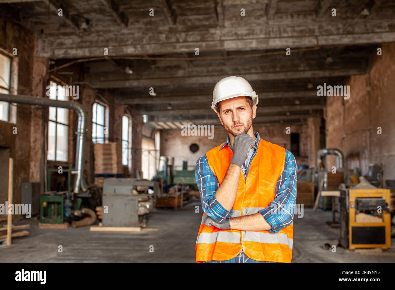 Young engineer in helmet protective hi-res stock photography and images ...