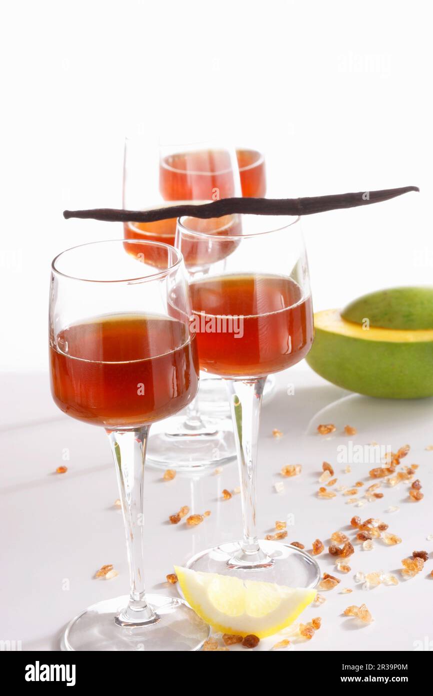 Homemade mango liqueur with vanilla and rock sugar Stock Photo - Alamy