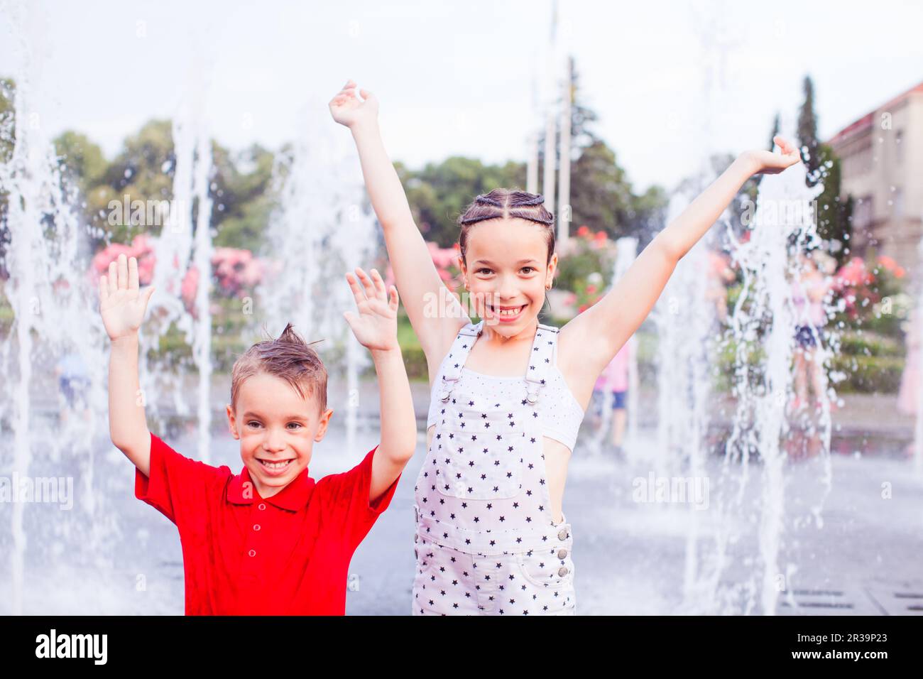 Kids enjoy the opportunity to freshen up Stock Photo - Alamy