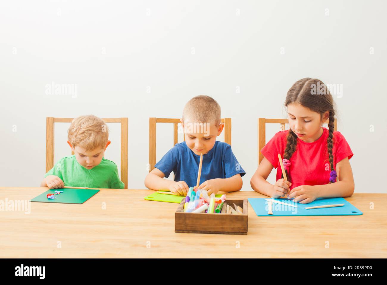 Kids modeling with colorful dough at home Stock Photo - Alamy