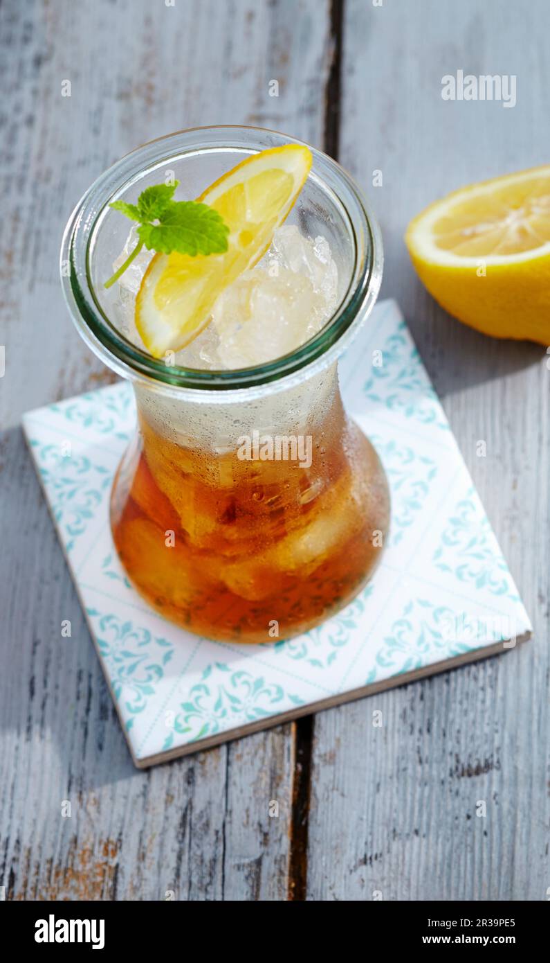 Homemade beer liqueur with corn schnapps, vanilla, crushed ice and ...