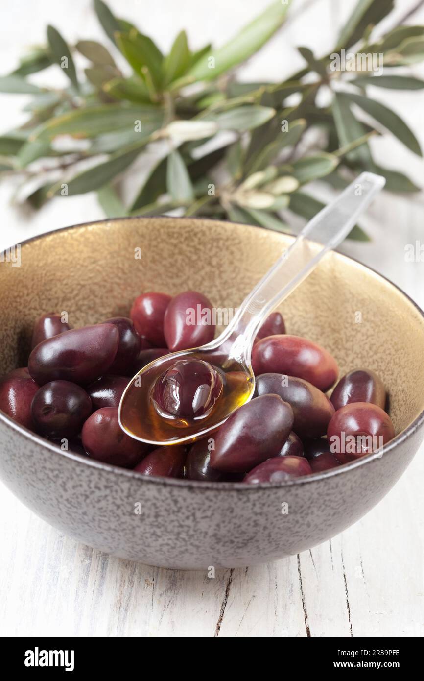 Olives in small plastic hi-res stock photography and images - Alamy