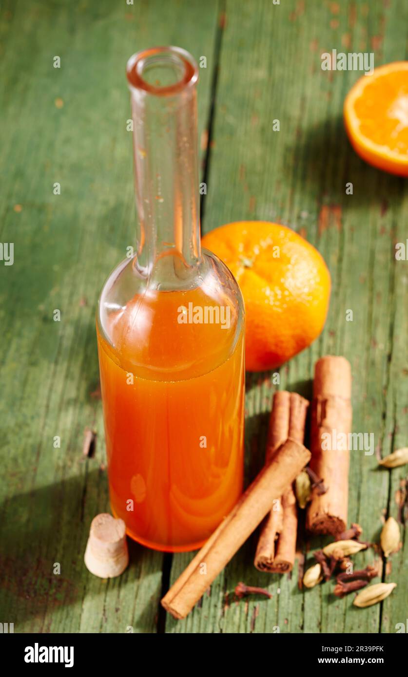 Homemade mandarin spice syrup with cinnamon Stock Photo - Alamy