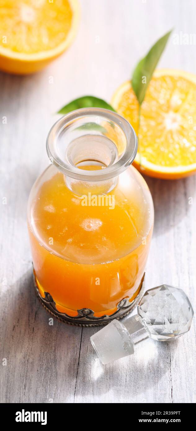 Homemade orange syrup with fresh fruits Stock Photo - Alamy
