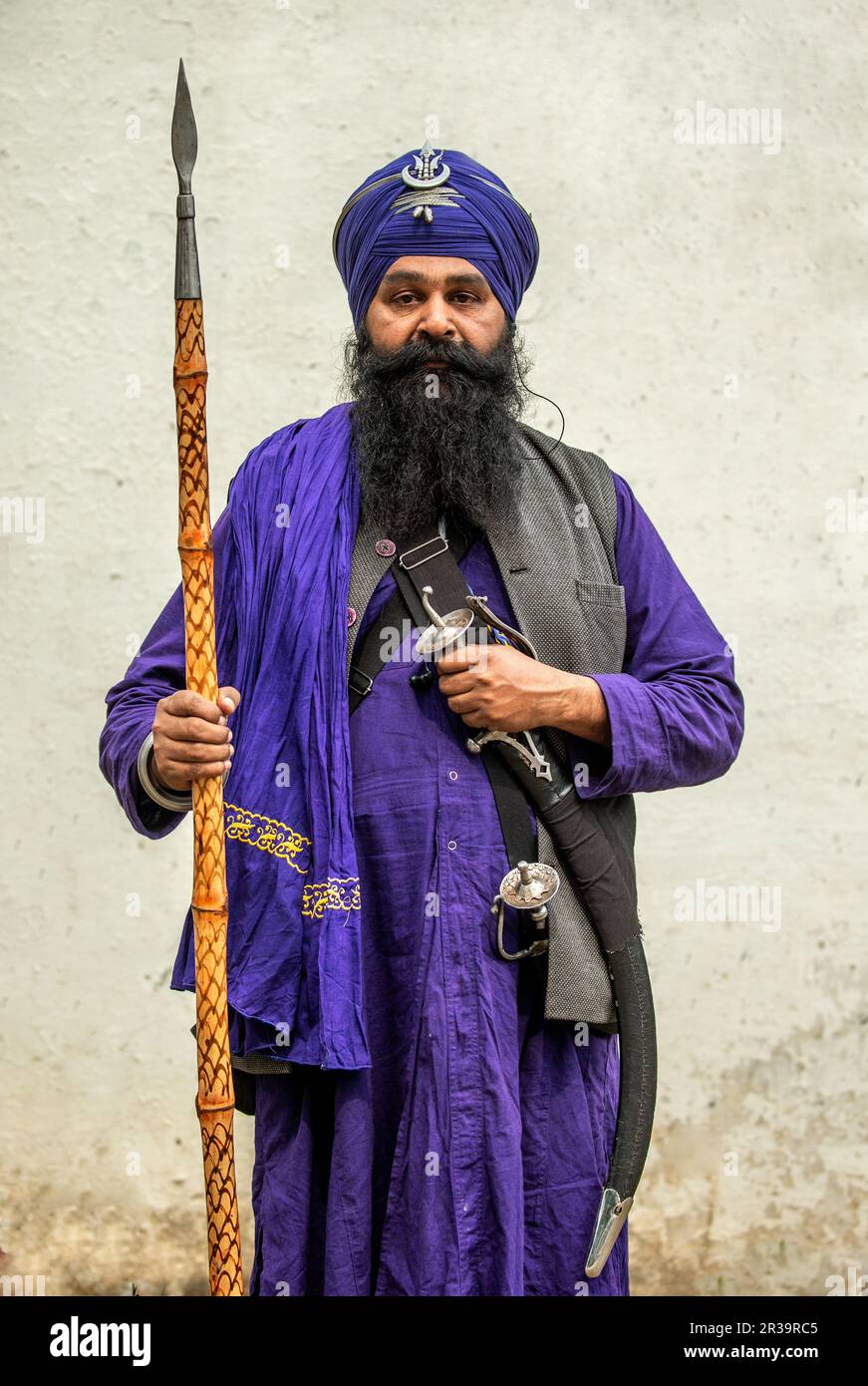 Portrait of a Sikh warrior in traditional dress with weapons Stock ...