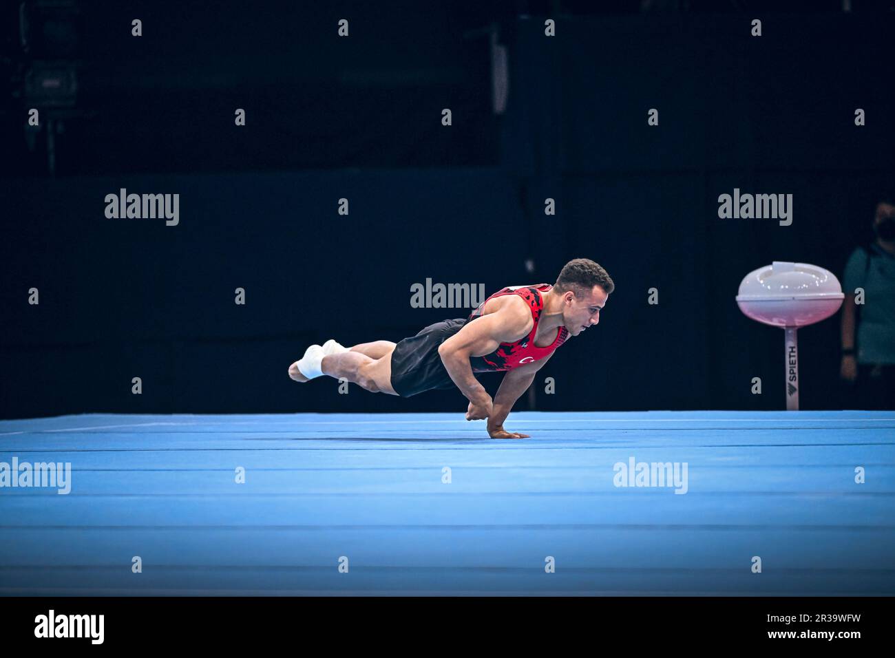 Adem Asil participating in the 2022 Munich European Gymnastics ...