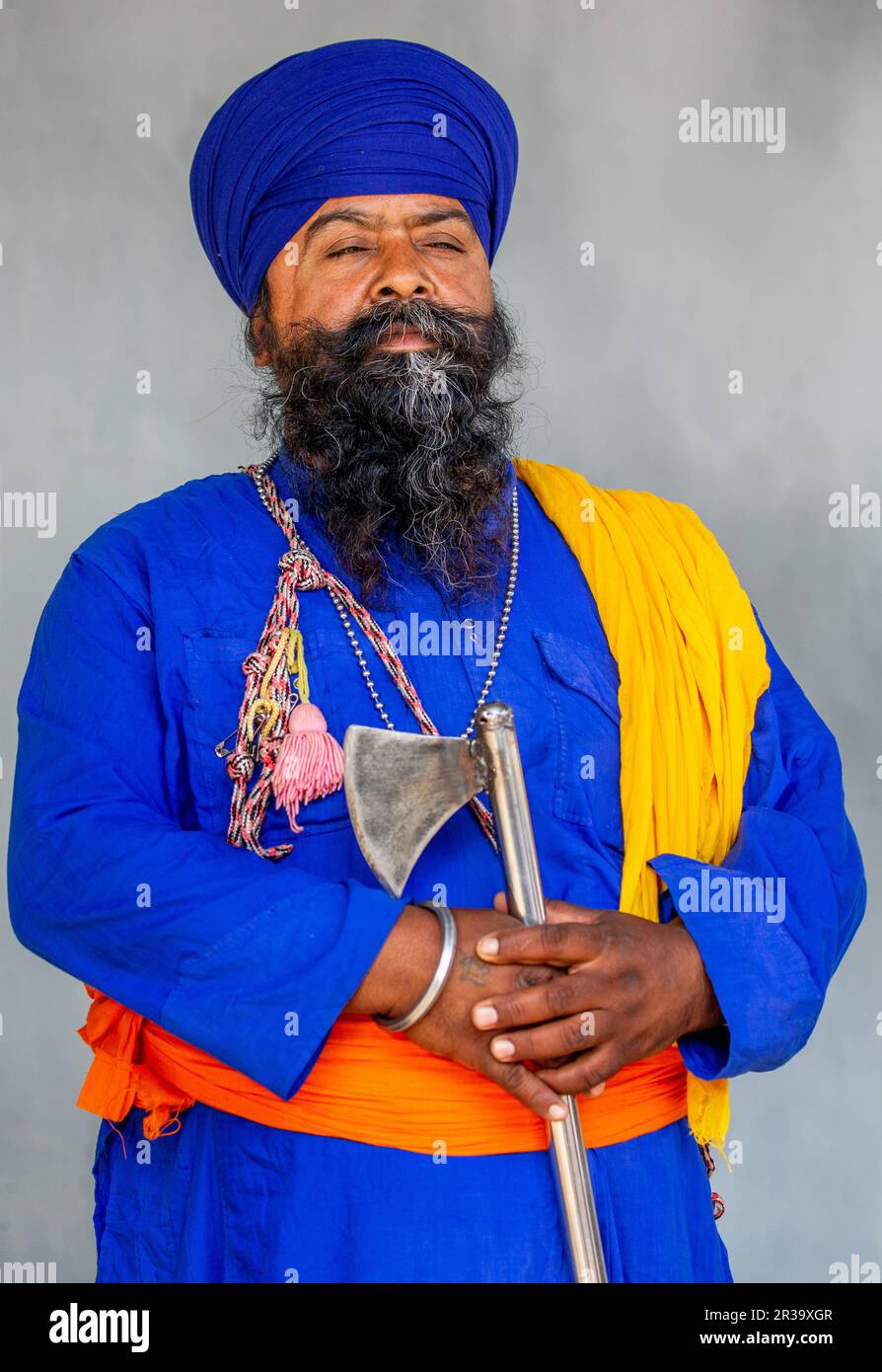 Portrait of a Sikh warrior in traditional dress with weapons Stock ...
